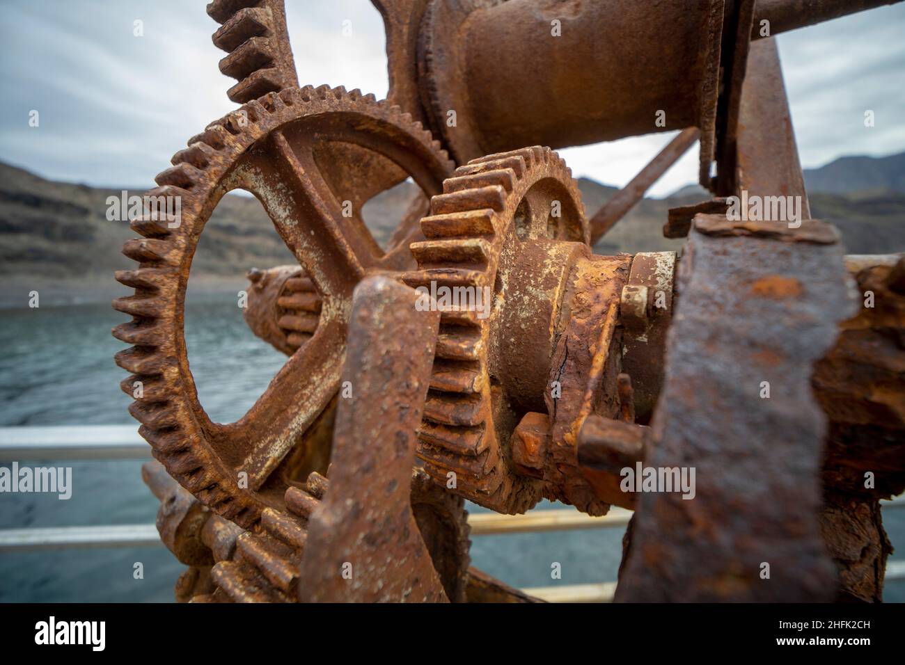 Details of a parts the moving parts of a rusty machine mechanical gear ...