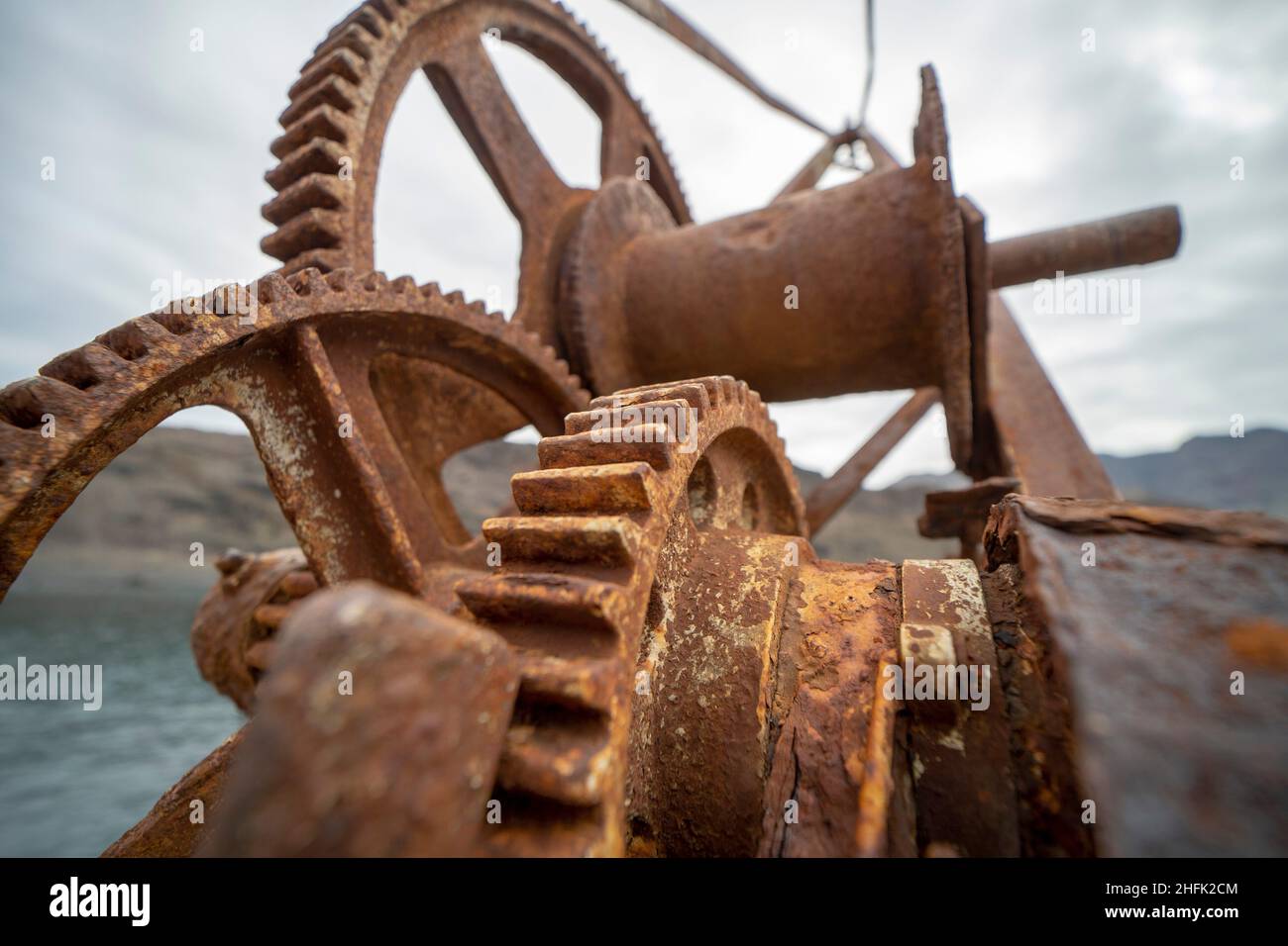 Details of a parts the moving parts of a rusty machine mechanical gear ...