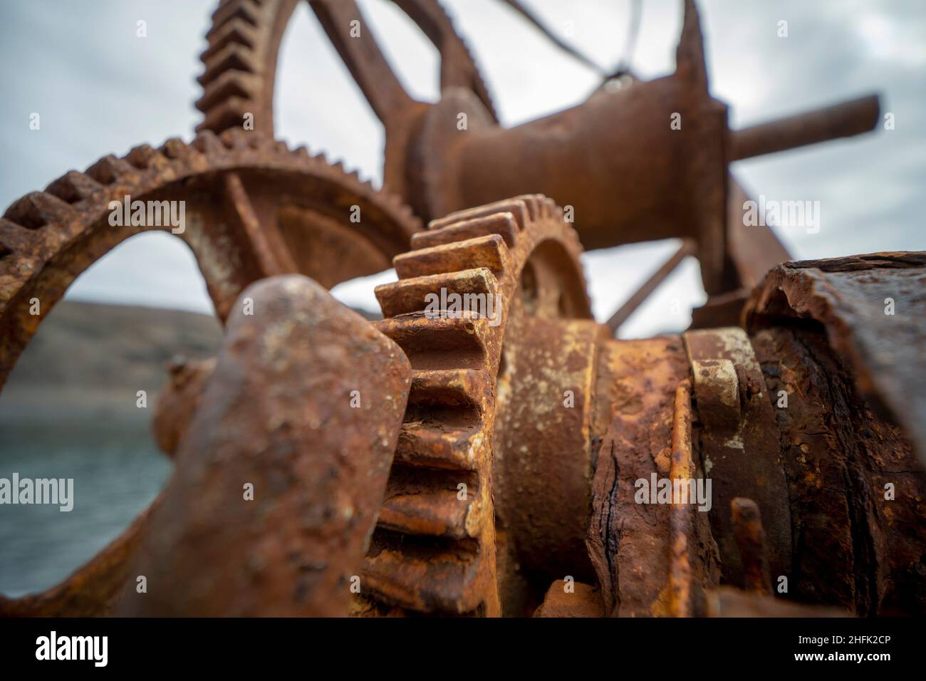 Details of a parts the moving parts of a rusty machine mechanical gear ...