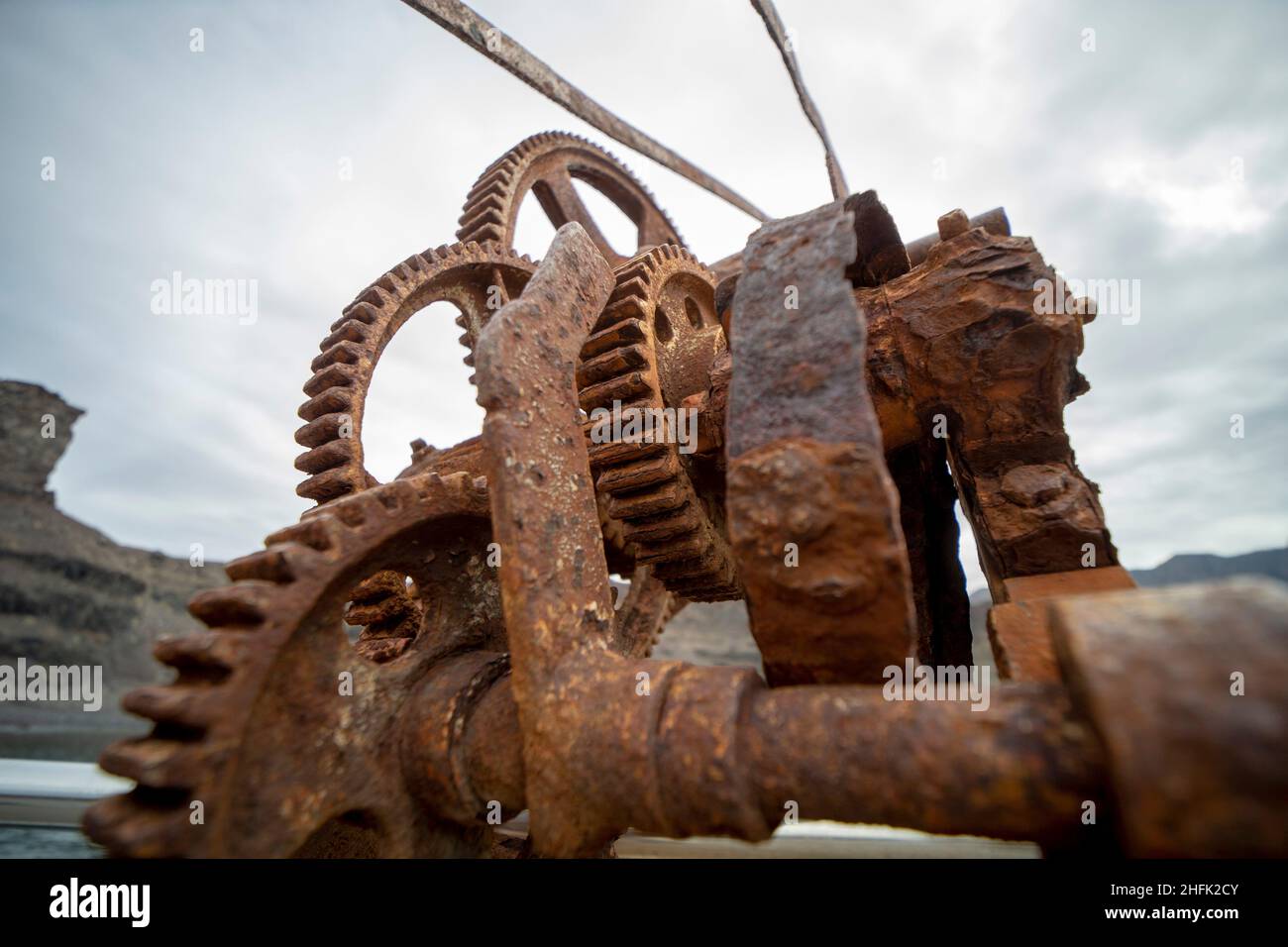 Details of a parts the moving parts of a rusty machine mechanical gear ...