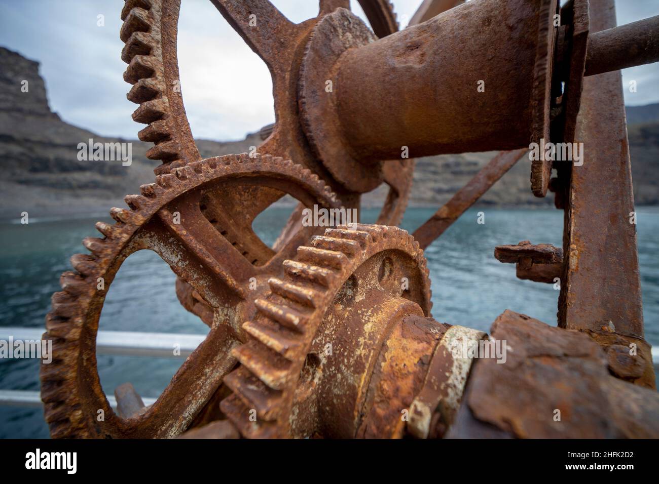 Details of a parts the moving parts of a rusty machine mechanical gear ...