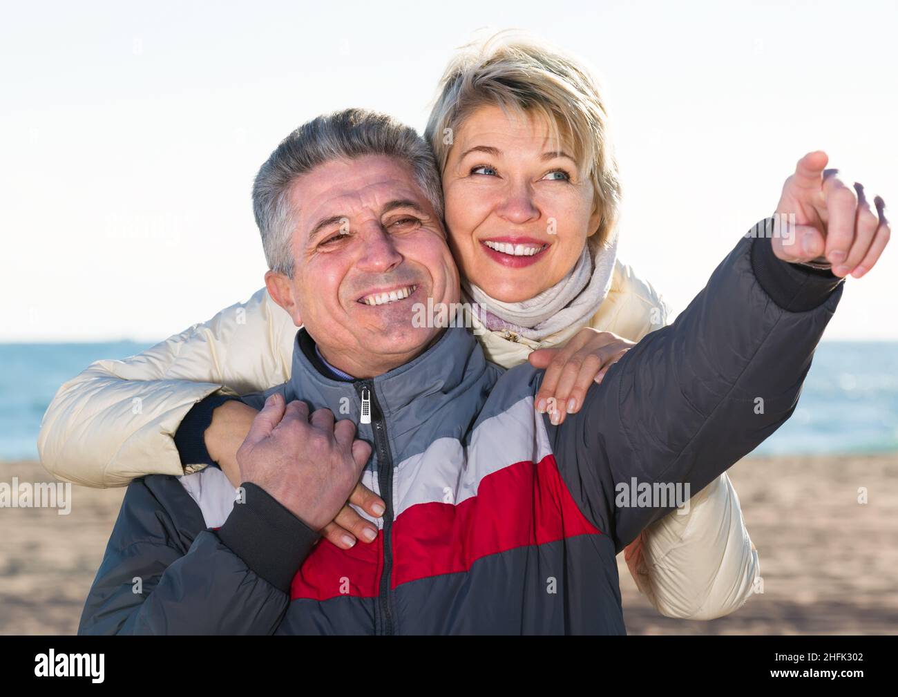 positive husband and wife show each other hands interesting things ...
