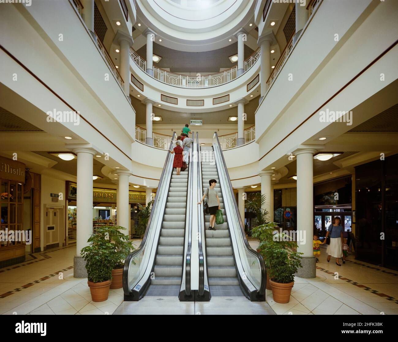 Eldon Garden shopping centre, Percy Street, Newcastle upon Tyne, 03/07/1989. Shoppers using the ...