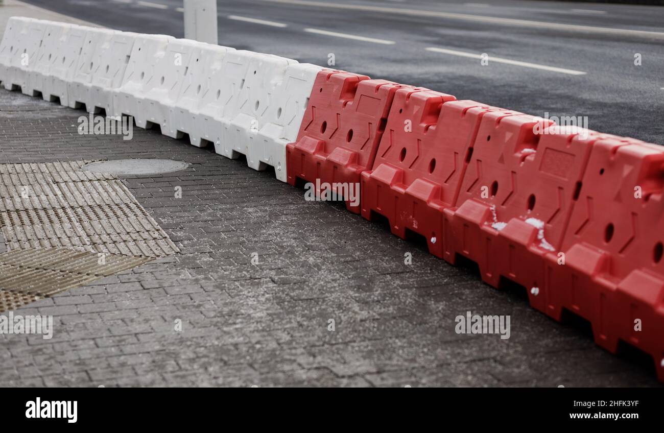 plastic road barriers. blocking the road in the city. danger Stock ...
