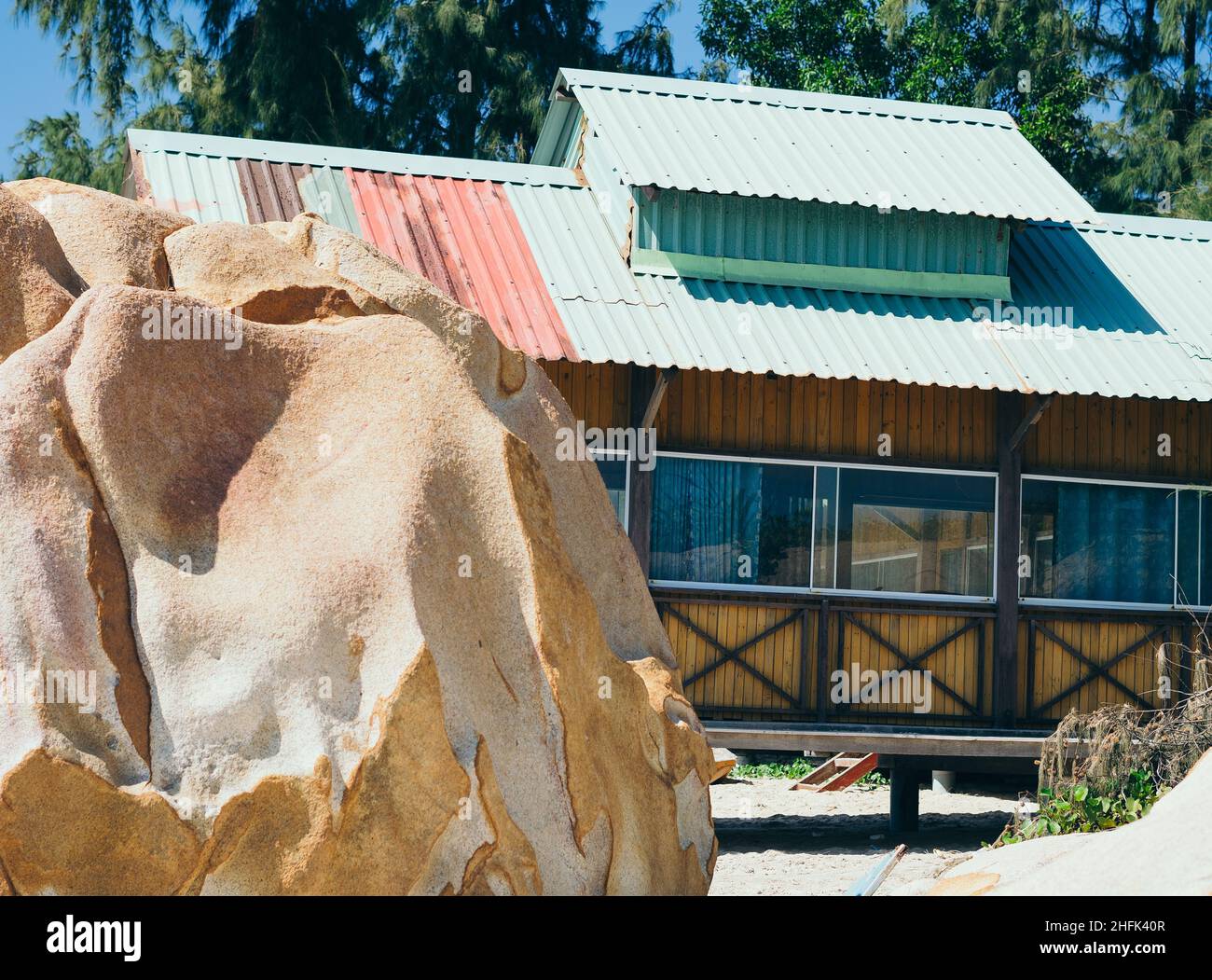 Outside view facade. Wood yellow boards material country house ...