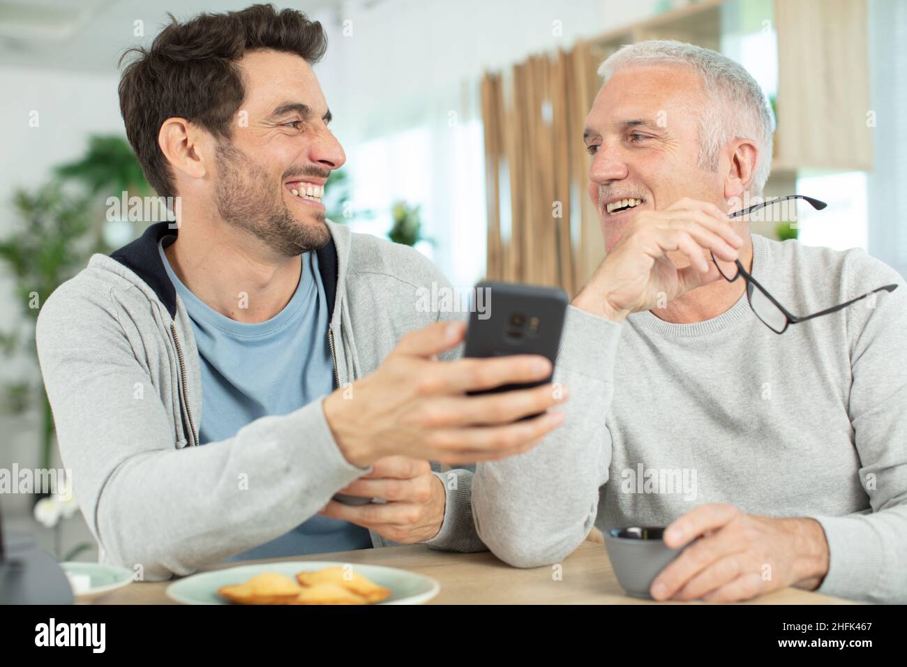 happy two generations doing a selfie shoot Stock Photo - Alamy