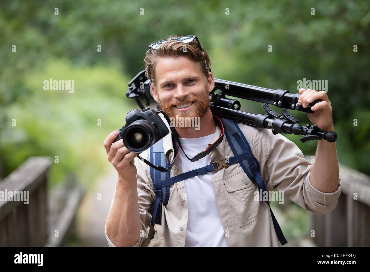 professional photographer with a camera Stock Photo - Alamy