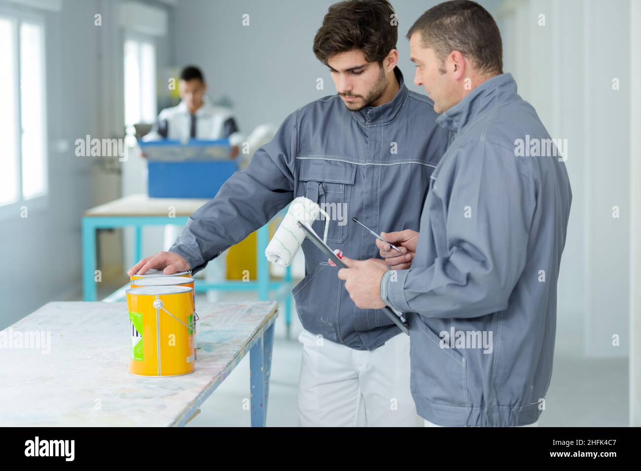 young apprentice painter in professional training Stock Photo - Alamy