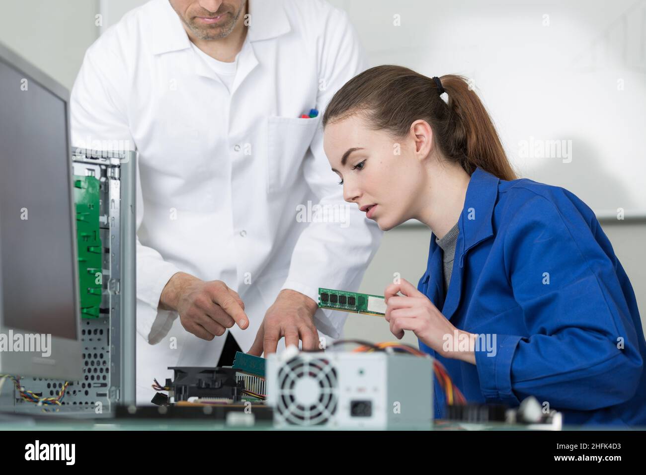 technician checks the electronic device Stock Photo - Alamy