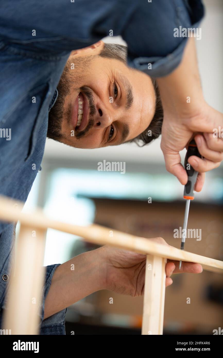Screwing screw do it yourself hi-res stock photography and images - Alamy