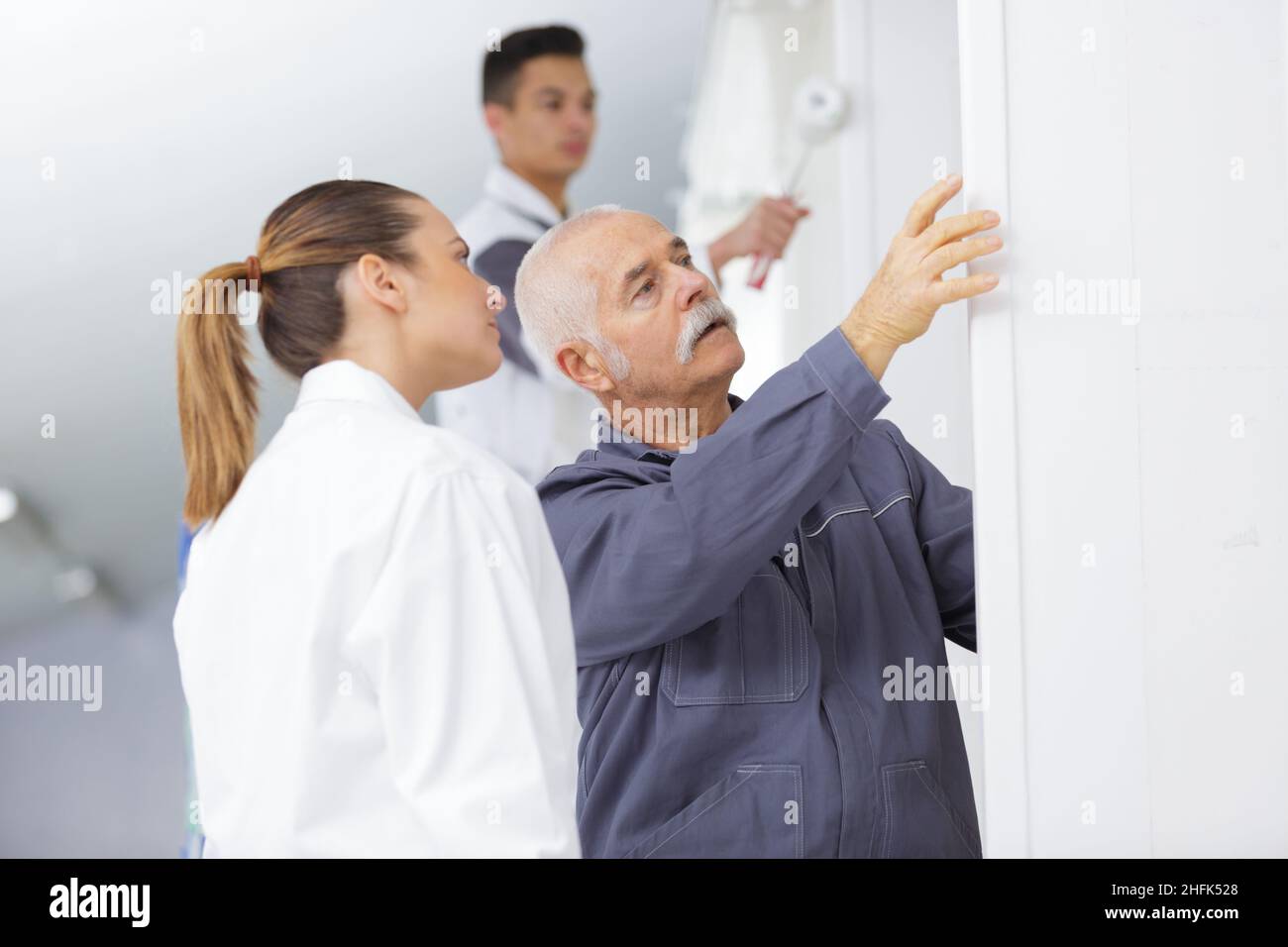 female student watching teacher Stock Photo - Alamy