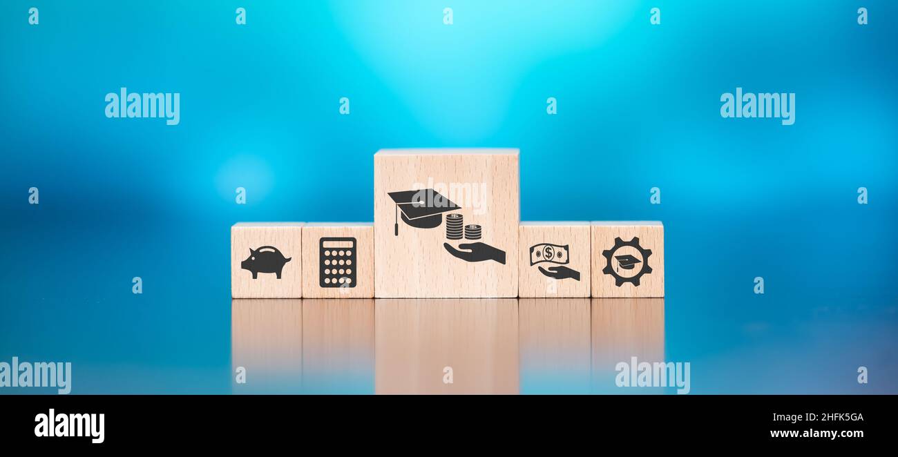 Wooden blocks with symbol of fafsa concept on blue background Stock ...