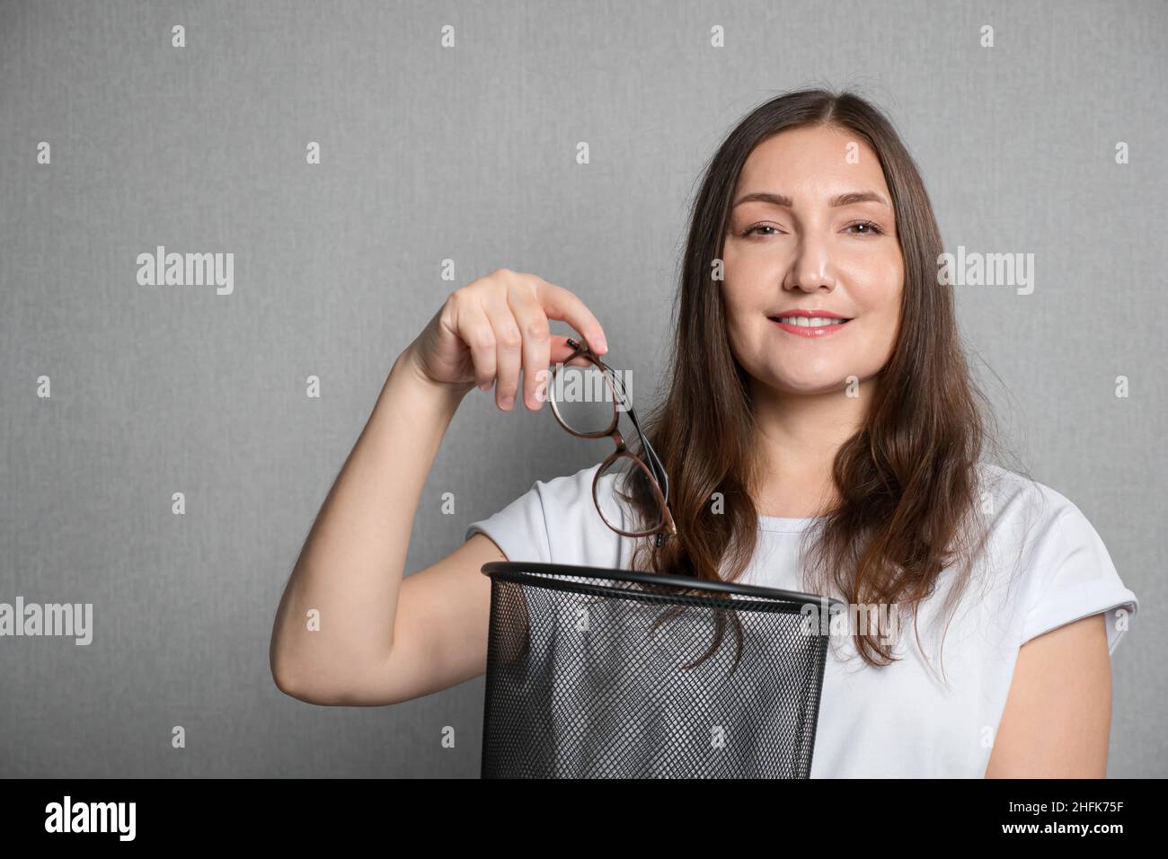 Young woman in trash can hi-res stock photography and images - Alamy