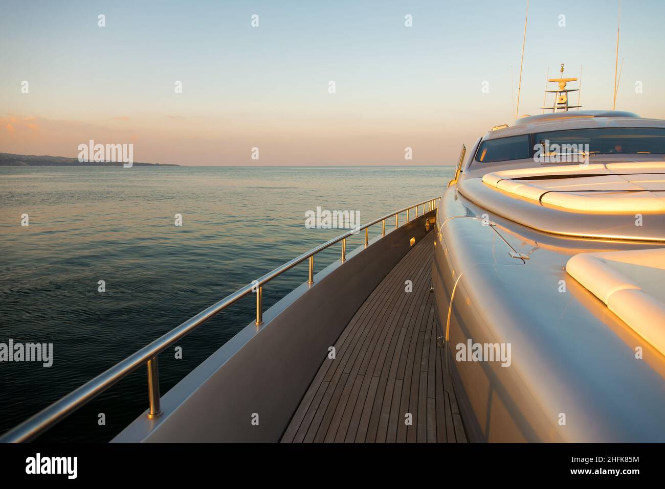 Beautiful sea view from the left board side of a luxury yacht at sunset ...