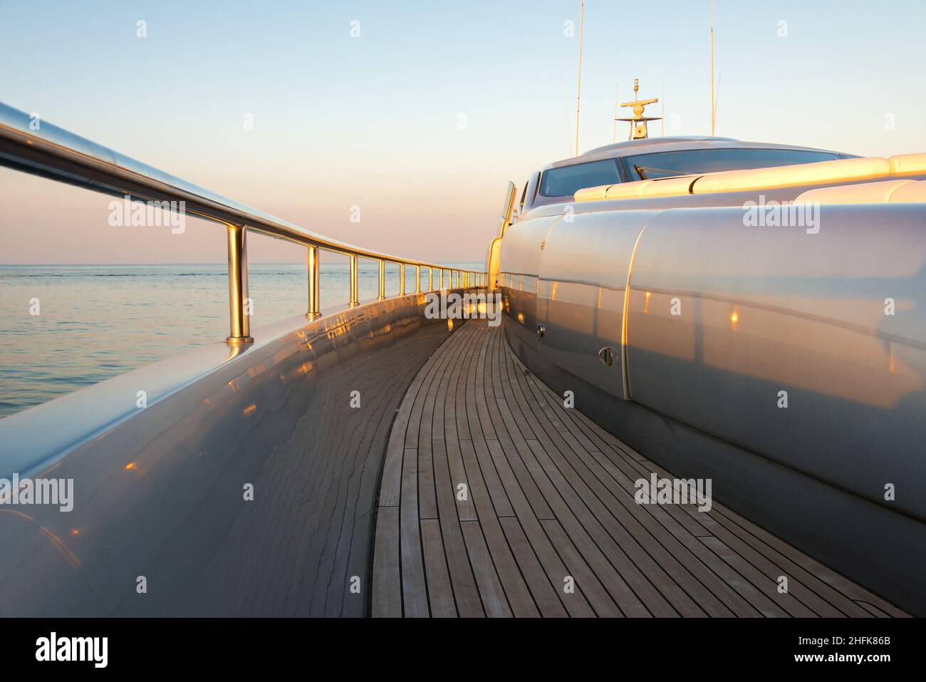 Beautiful sea view from the left board side of a luxury yacht at sunset ...