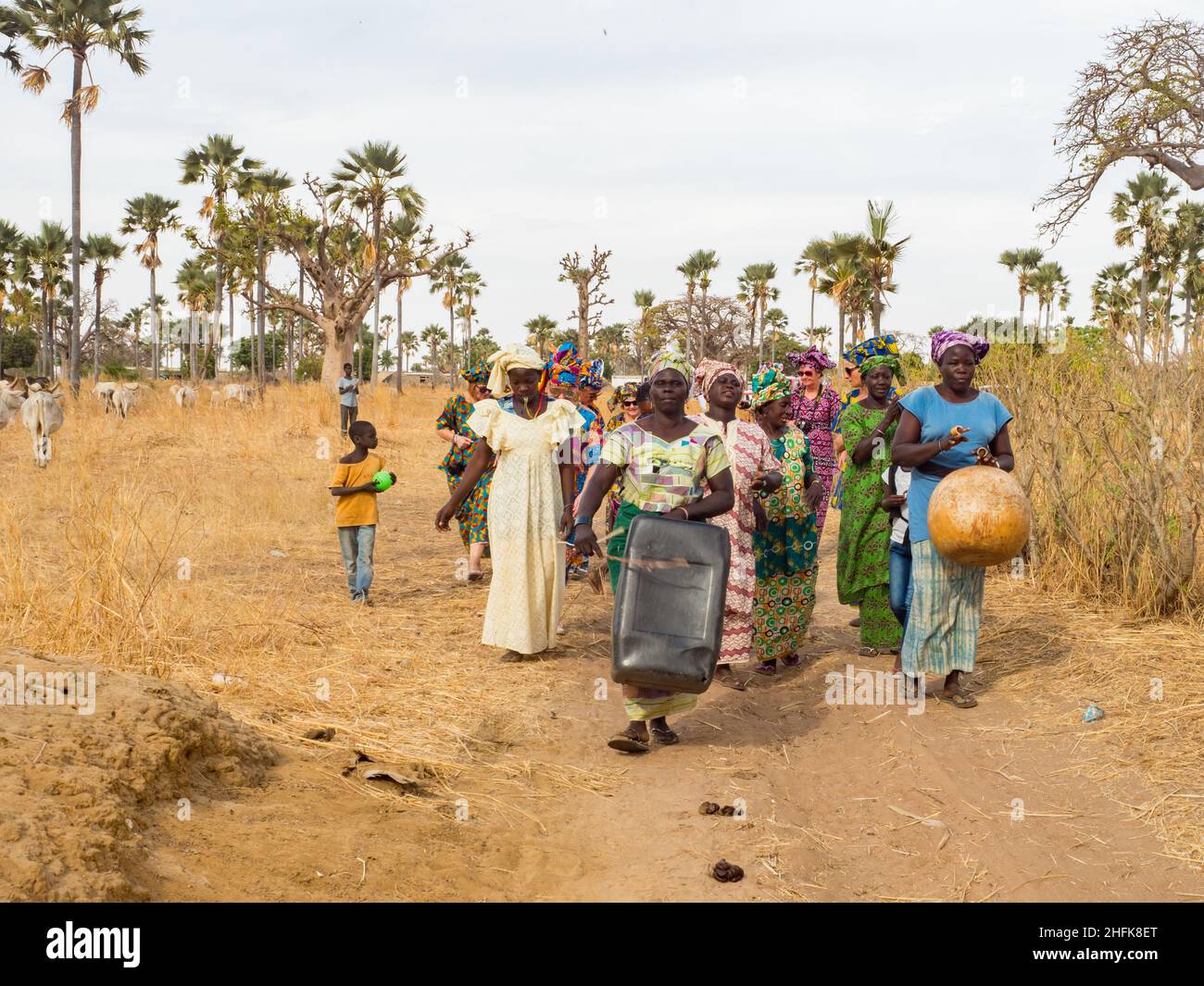 Senegal , Africa- Jan, 2019: Women dancing in a traditional costumes ...