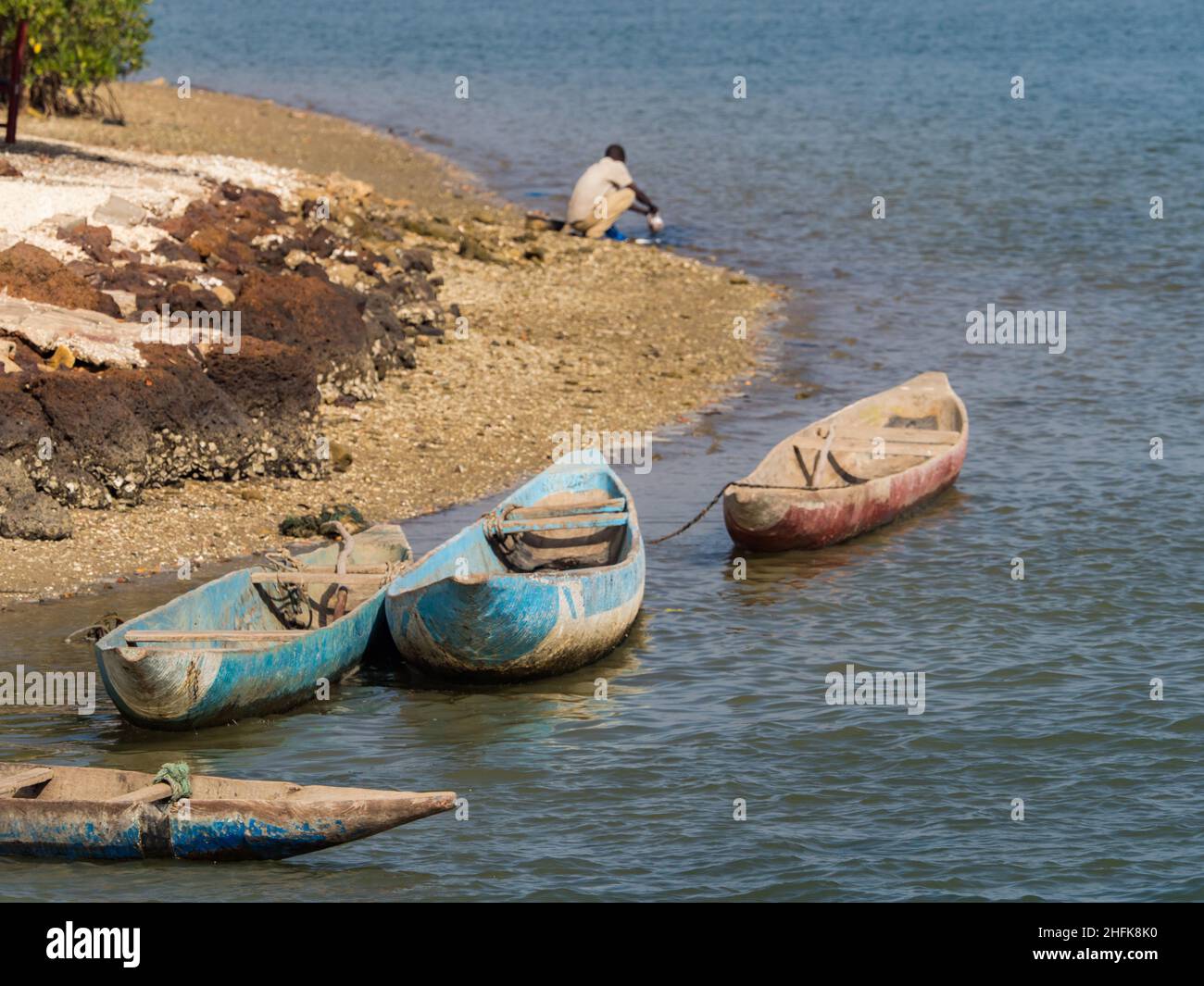 Joal-Fadiouth, Senegal - Jan 2019: Small wooden boats in the sea ...