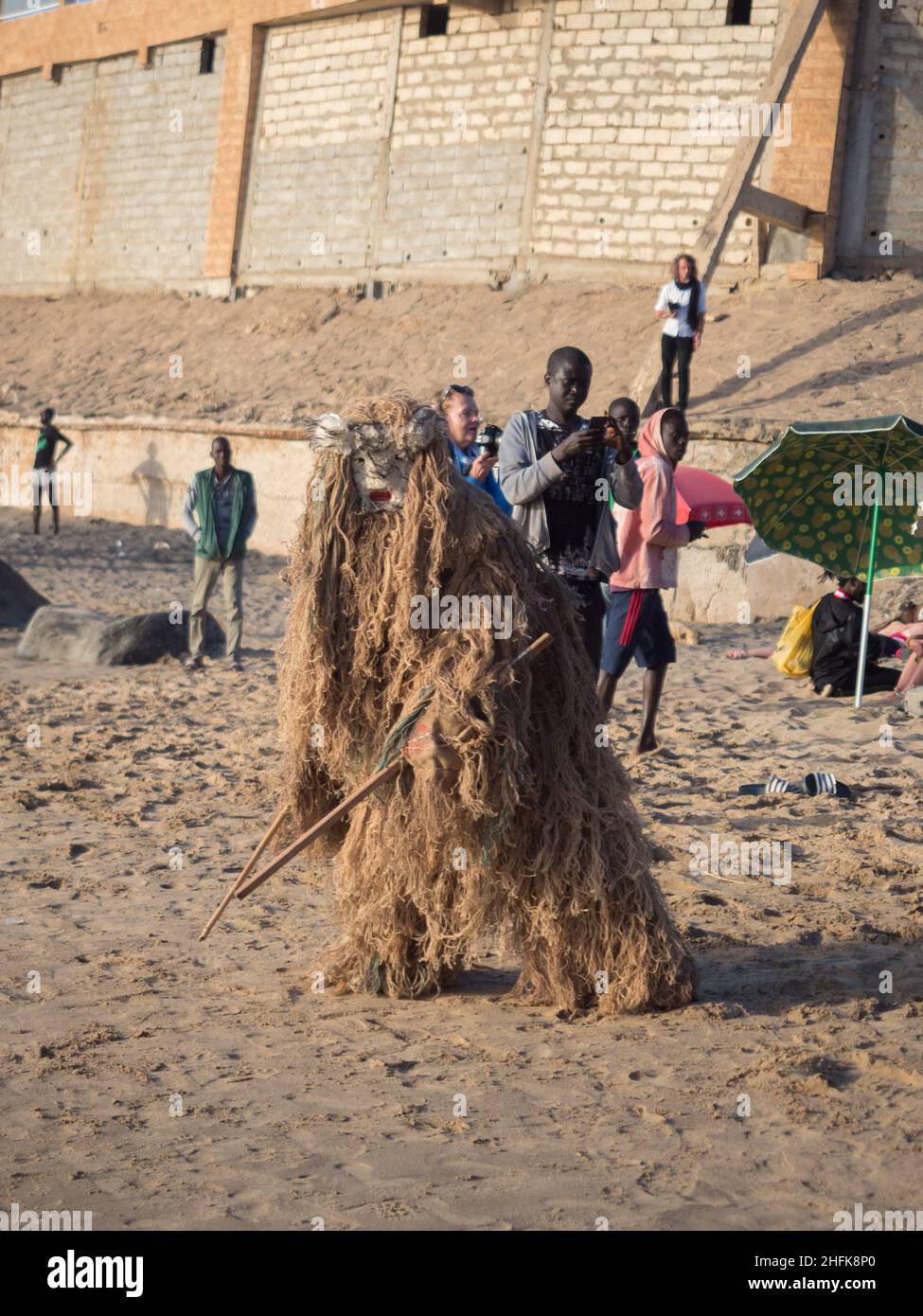 Dakar, Senegal - Feb, 2019: The Kumpo dance on the beach in Dakar. The ...