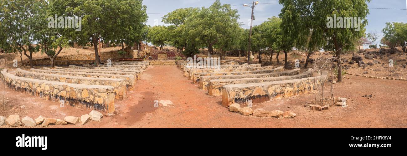 Popenguine, Senegal - January 2019: Stone benches arranged in a ...