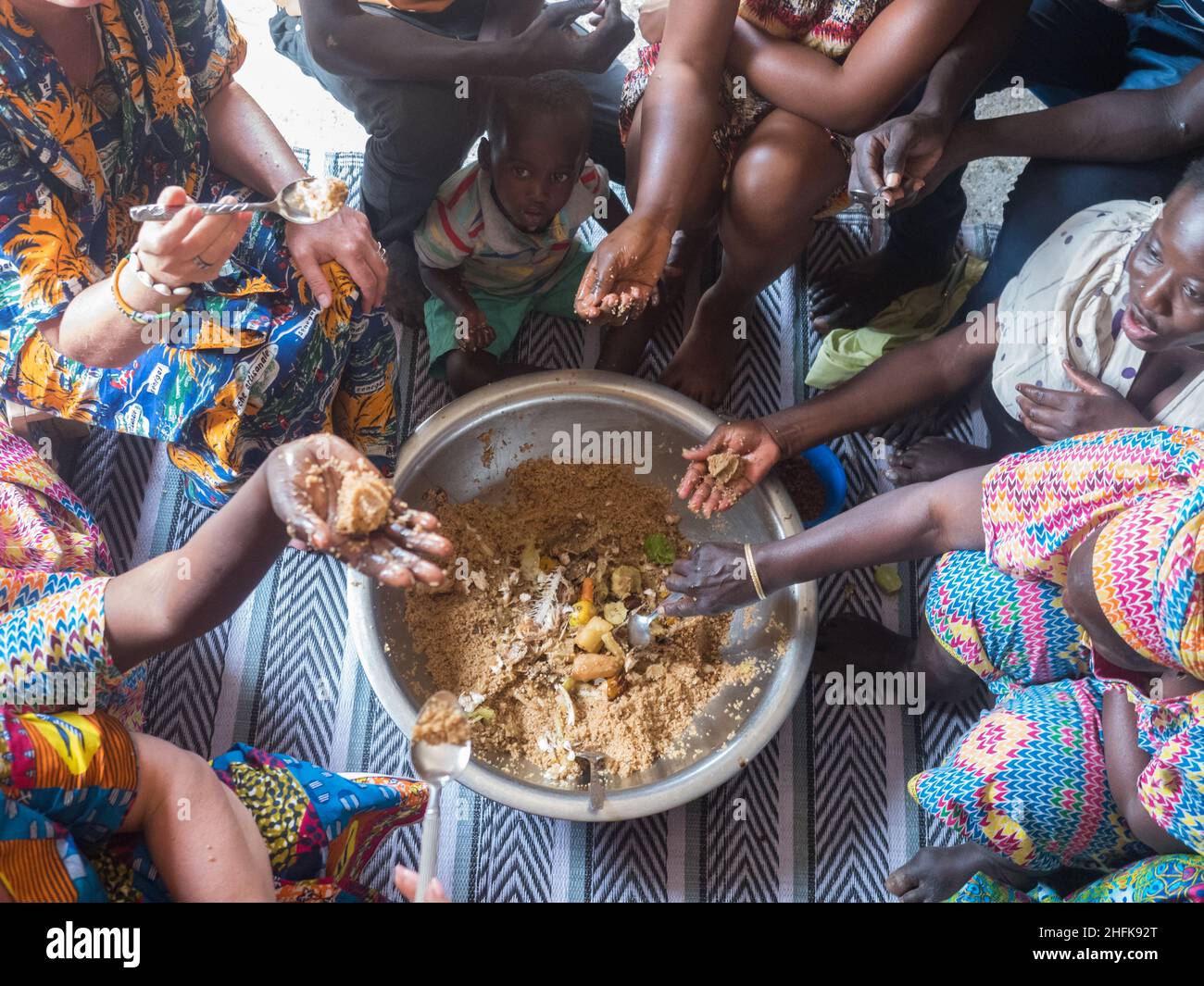 Senegal family eating together in the traditional manner. Senegal ...