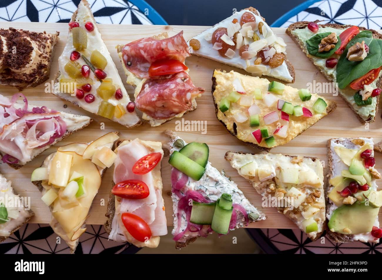 Plate with Scandinavian style open-faced colorful sandwiches Stock ...