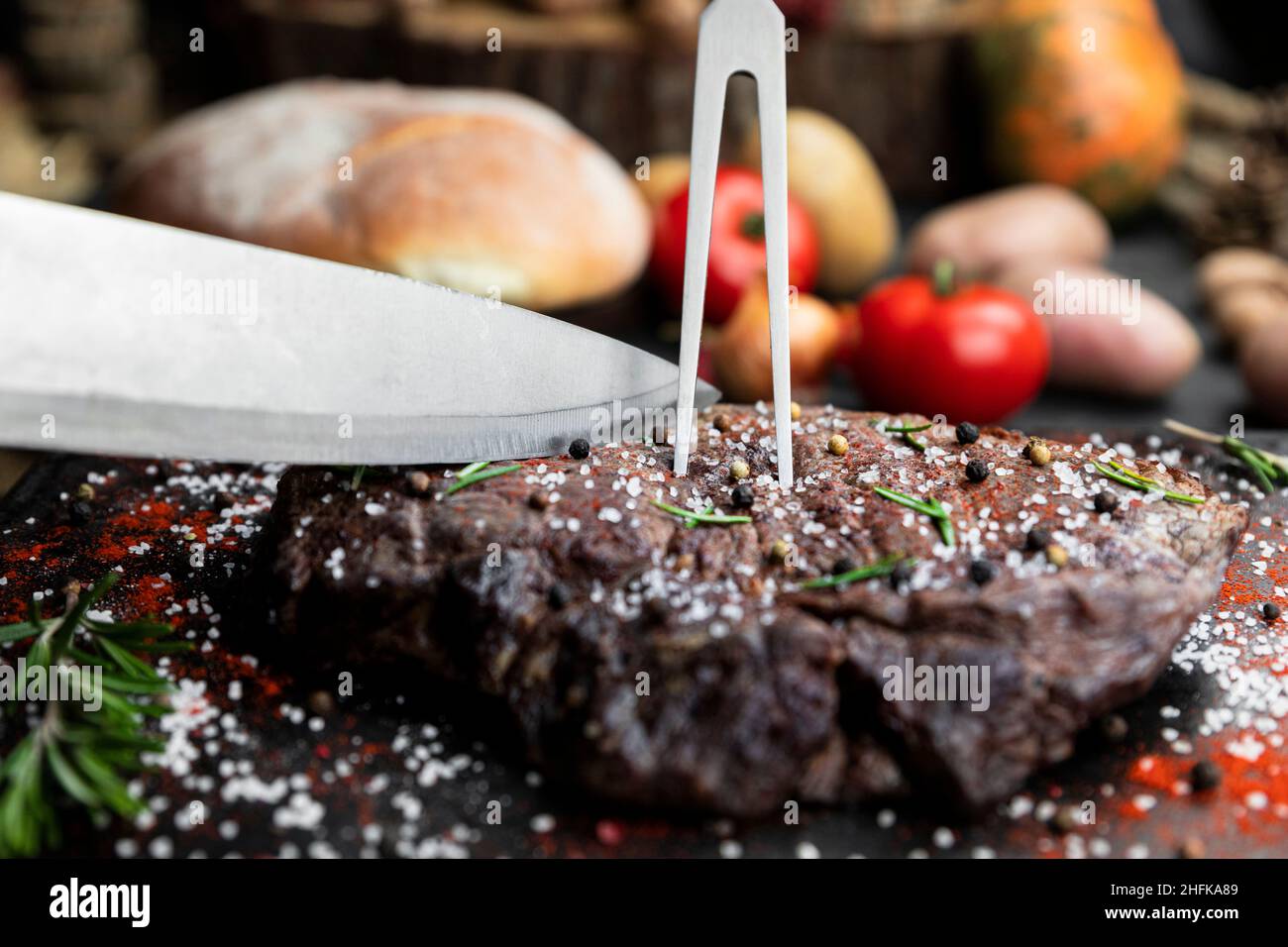 Beef steak ready to be cut in to pieces Stock Photo - Alamy