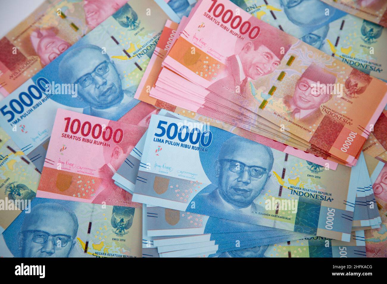 random indonesian paper currencies background Stock Photo - Alamy
