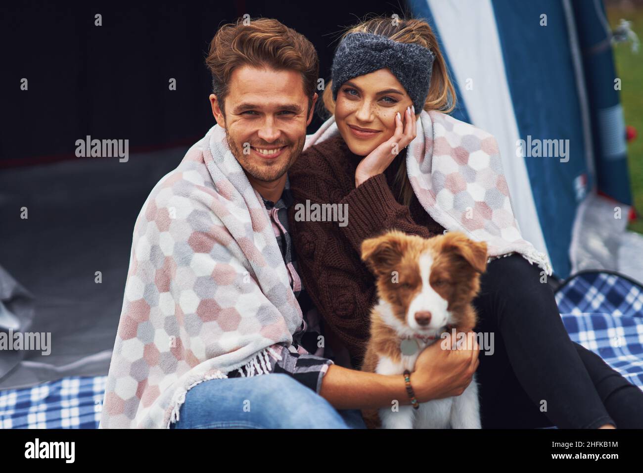 Young nice couple having fun on camping Stock Photo - Alamy
