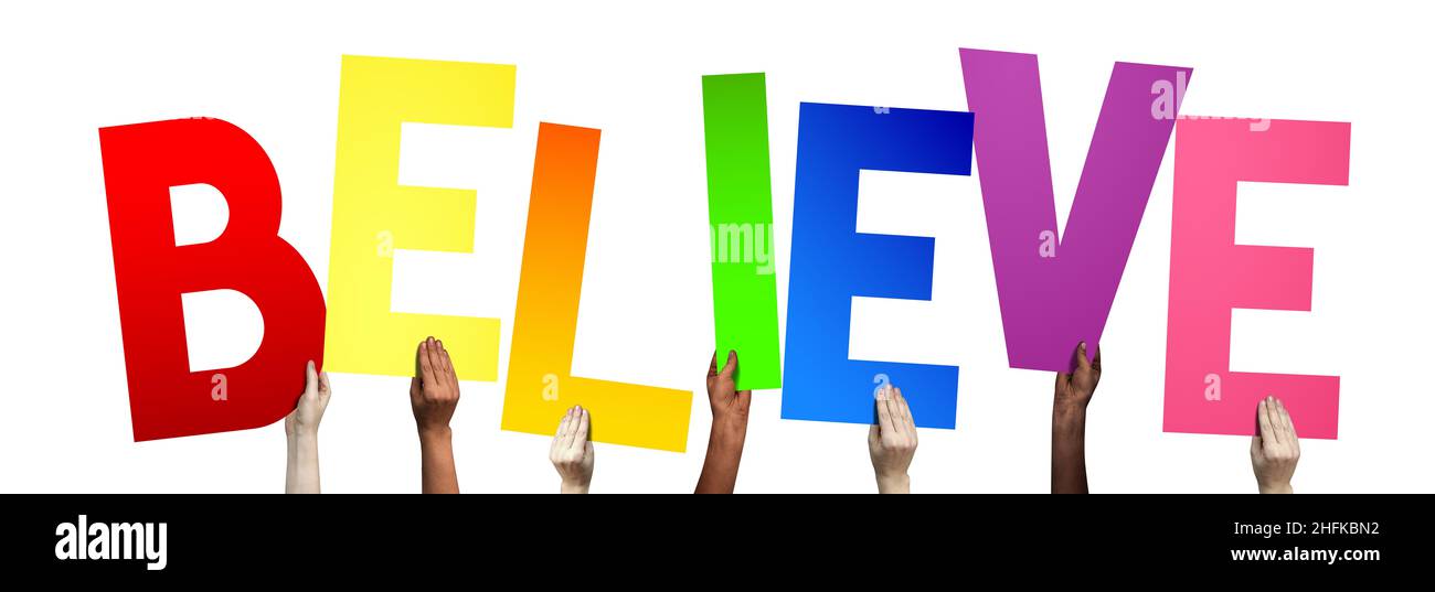 Believe - human hands holding colorful letters Stock Photo - Alamy