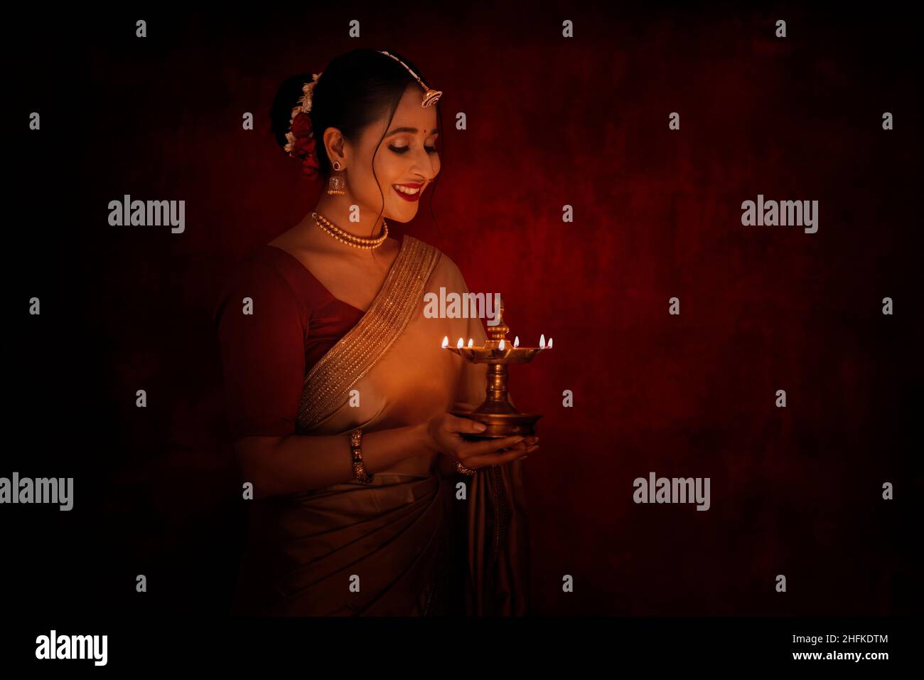 Lady holding a lamp hi-res stock photography and images - Alamy