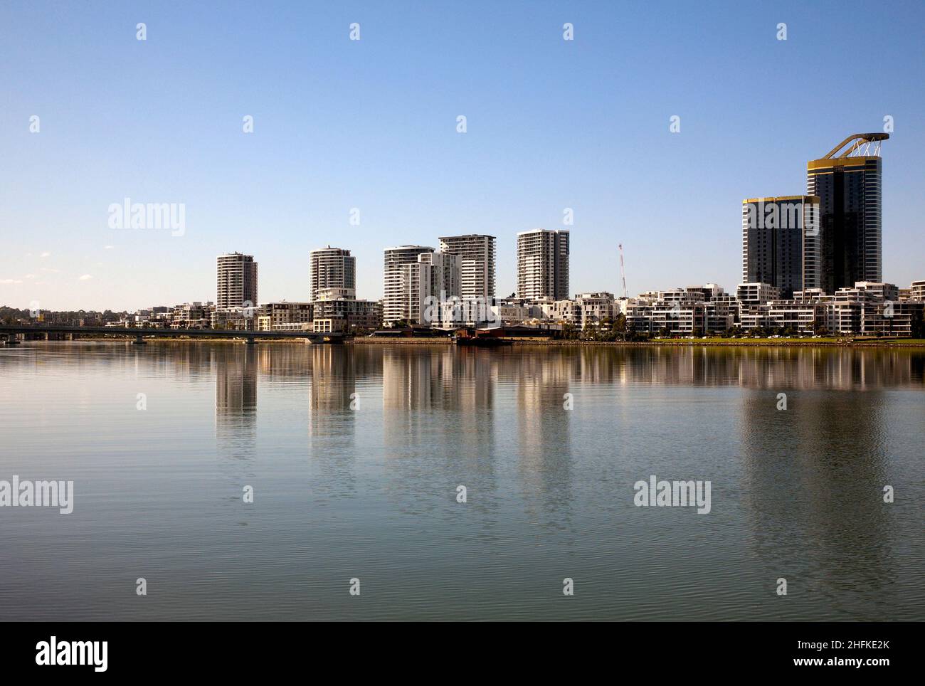 Colour photograph of Homebush Bay and high-rise urban development ...