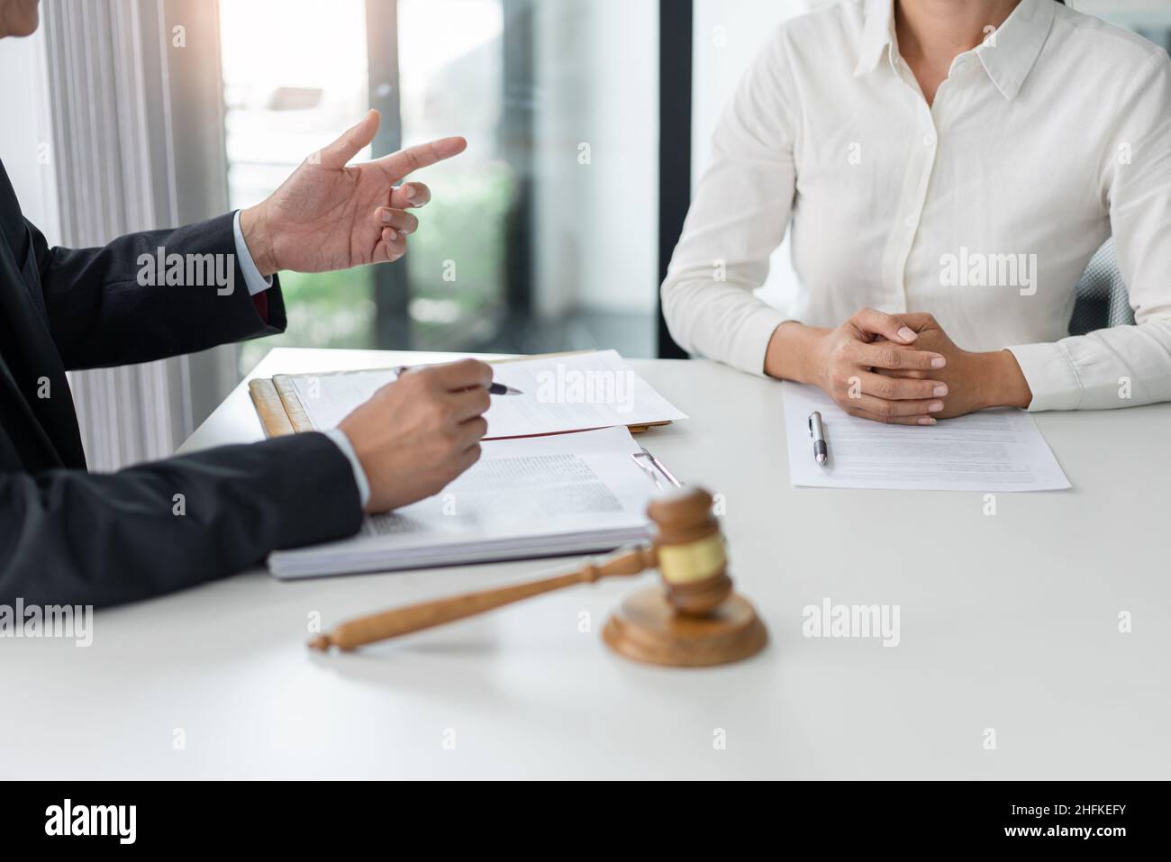 law concept the lawyer partner who wears simple white shirt attempting ...