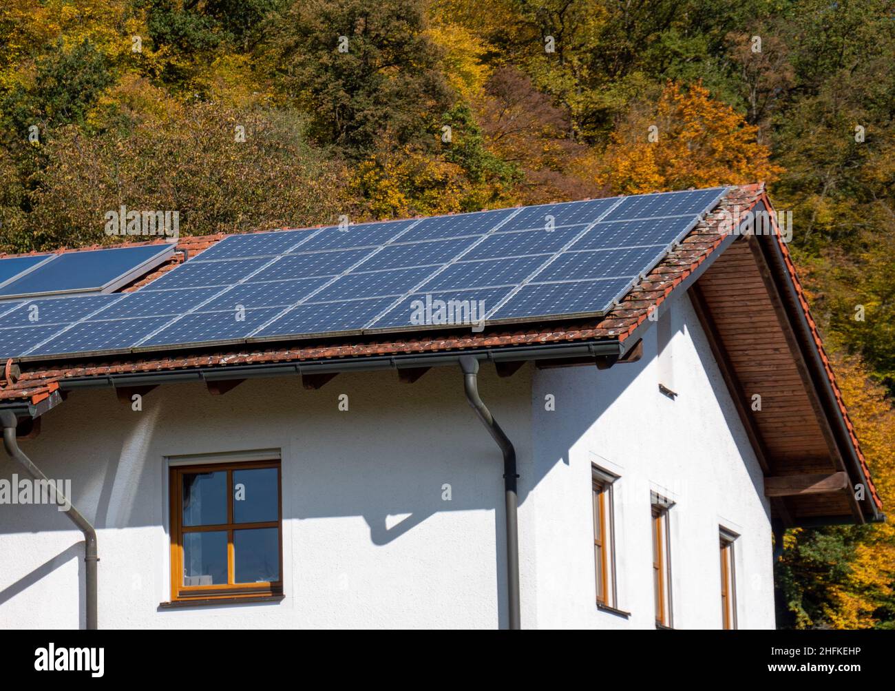 solar panels on a roof House Stock Photo - Alamy
