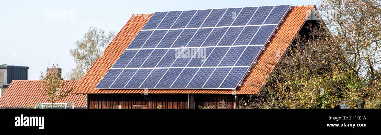 panorama solar panels on a roof Stock Photo - Alamy