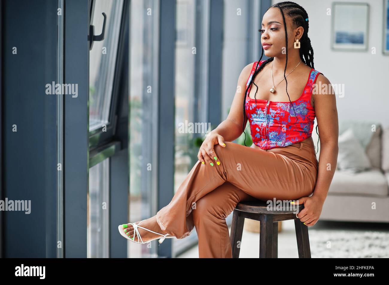 Beauty afro american model fashion brazilian woman pose indoor sit on ...