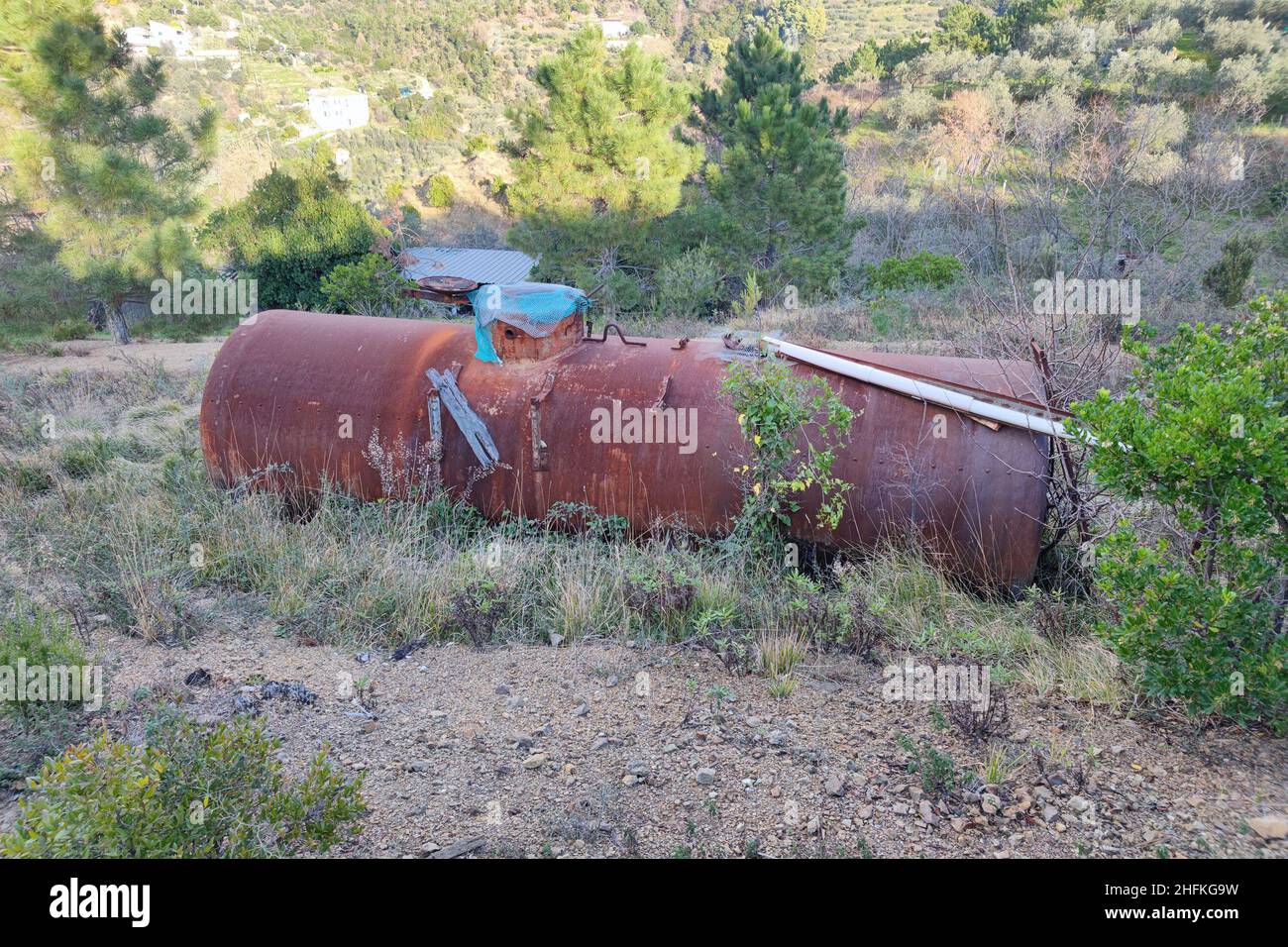 Old abandoned rusted water tank cistern Stock Photo - Alamy