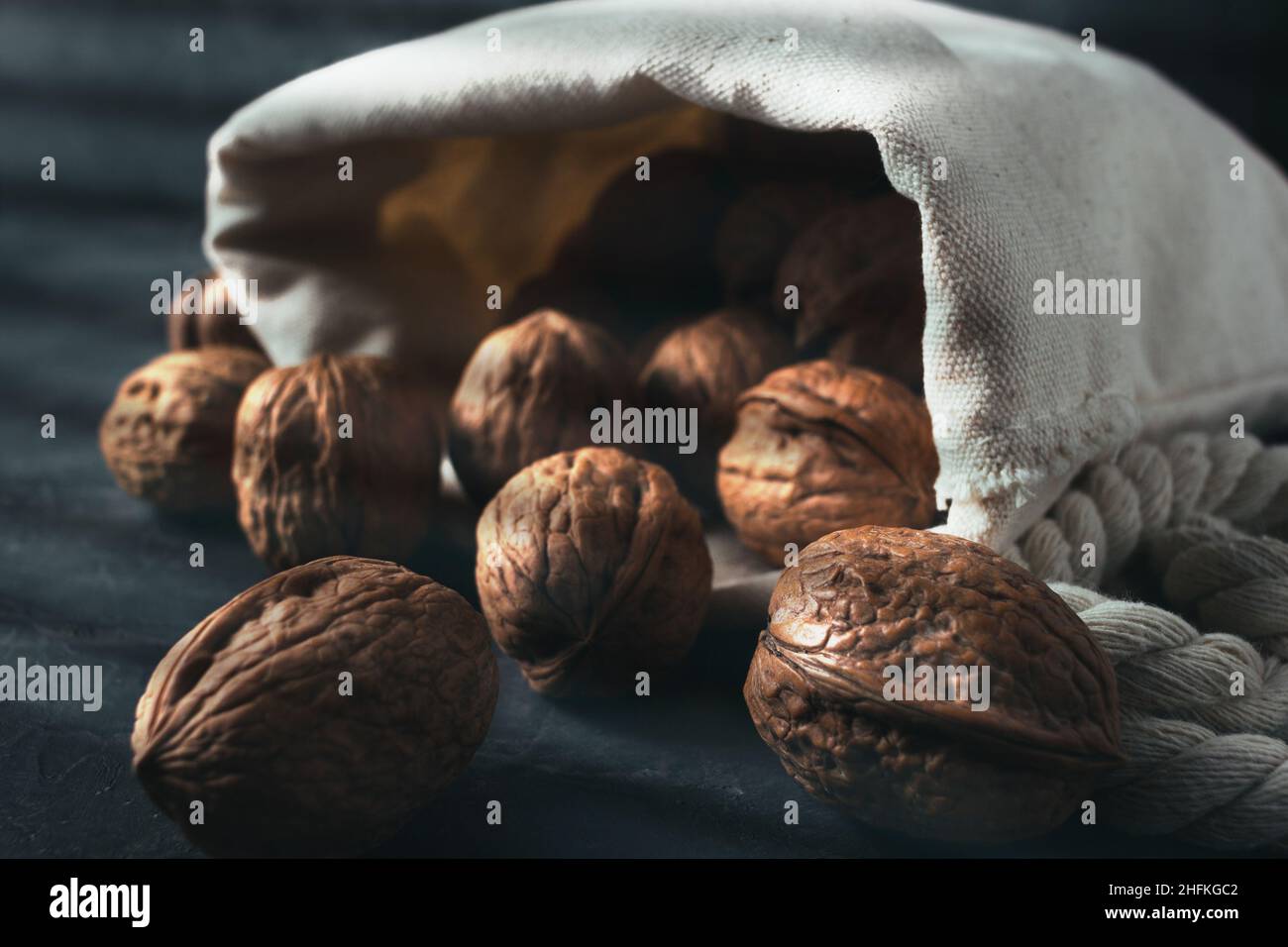 Sack of walnuts with copy space in dark mood shot Stock Photo - Alamy
