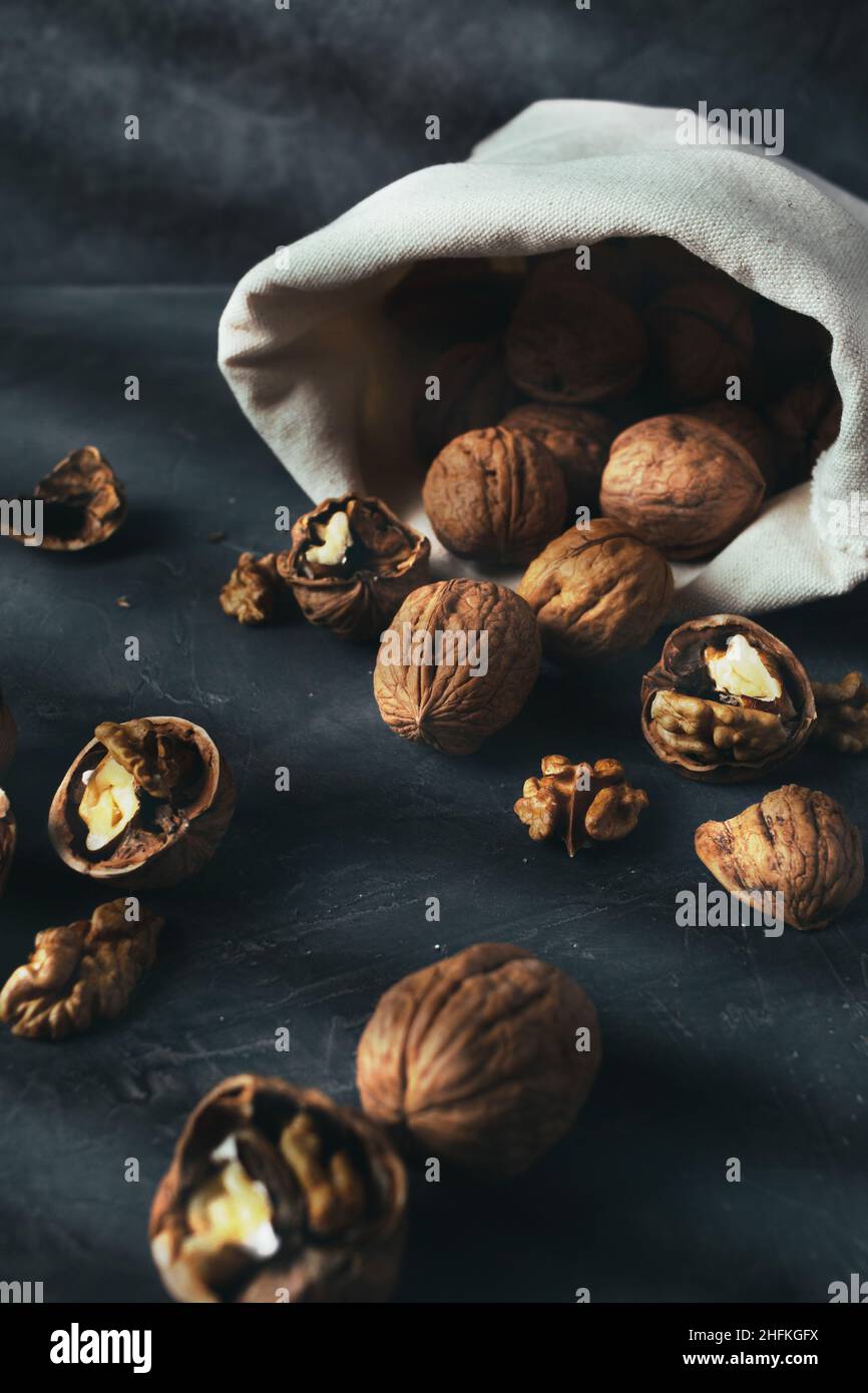 Sack of walnuts with copy space in dark mood shot Stock Photo - Alamy