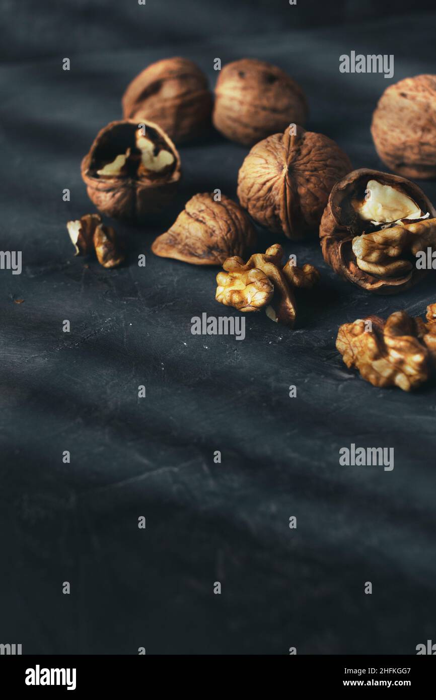 Fresh walnuts with copy space in dark mood shot Stock Photo - Alamy
