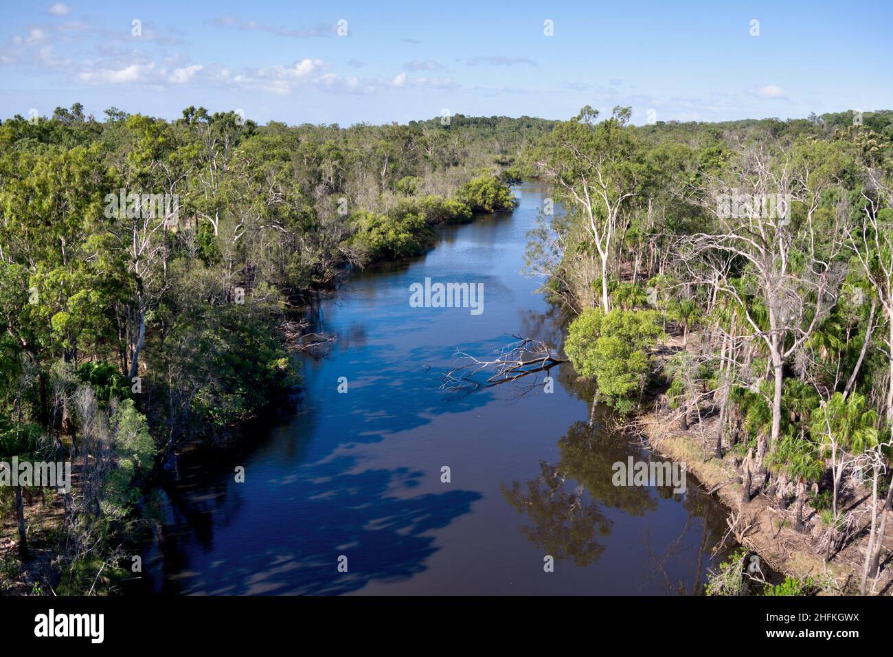 Aerial of Deepwater Creek as it flows to the ocean Queensland Australia ...