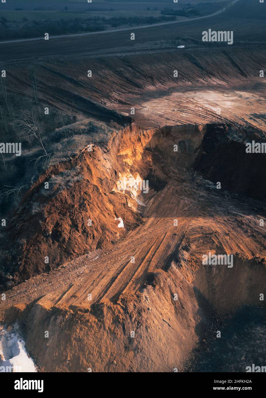 Excavated Industrial Clay Quarry in Sun Rays: Open-Pit Sand and Clay ...