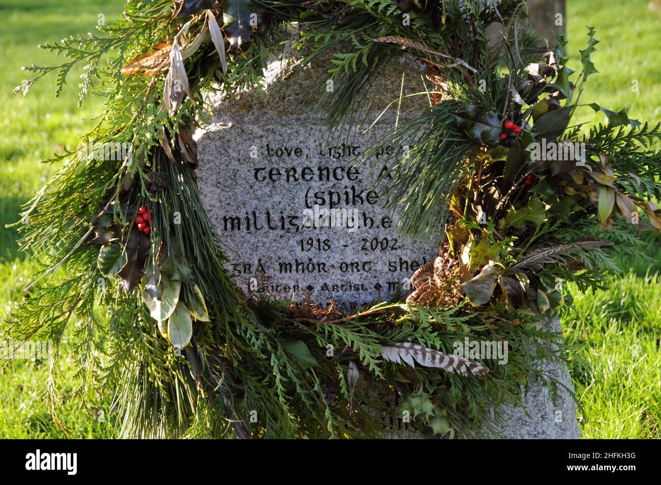 Spike Milligan's grave and headstone, with wreath, in the churchyard of ...