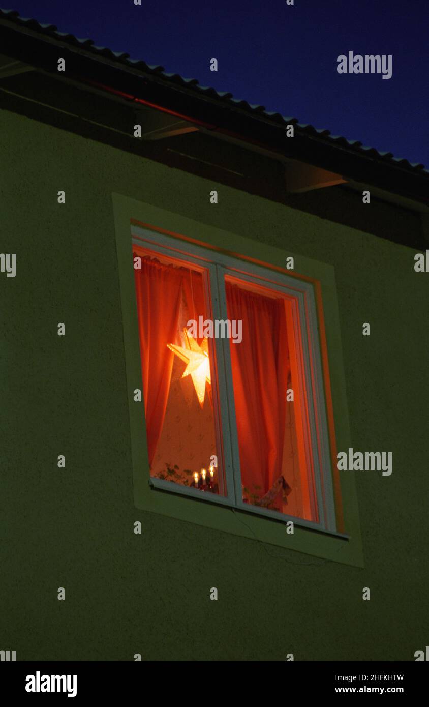 Advent star in window, Sweden Stock Photo - Alamy