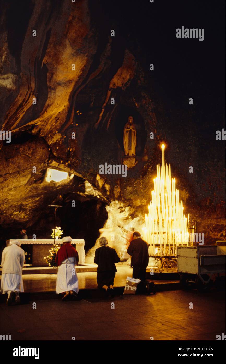 People praying , Lourdes, France Stock Photo - Alamy
