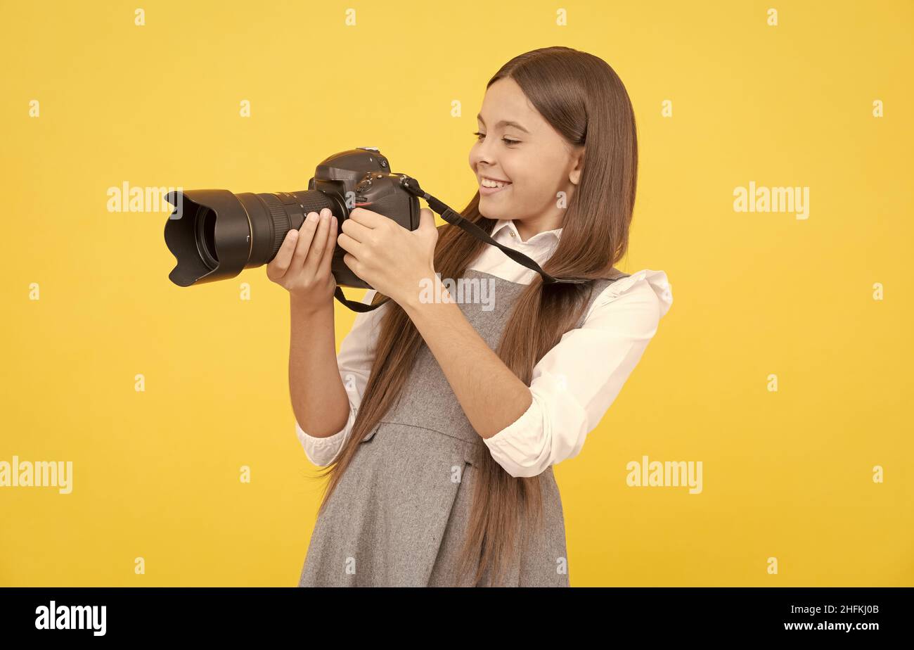 kid use digital camera. happy child photographing. school of ...