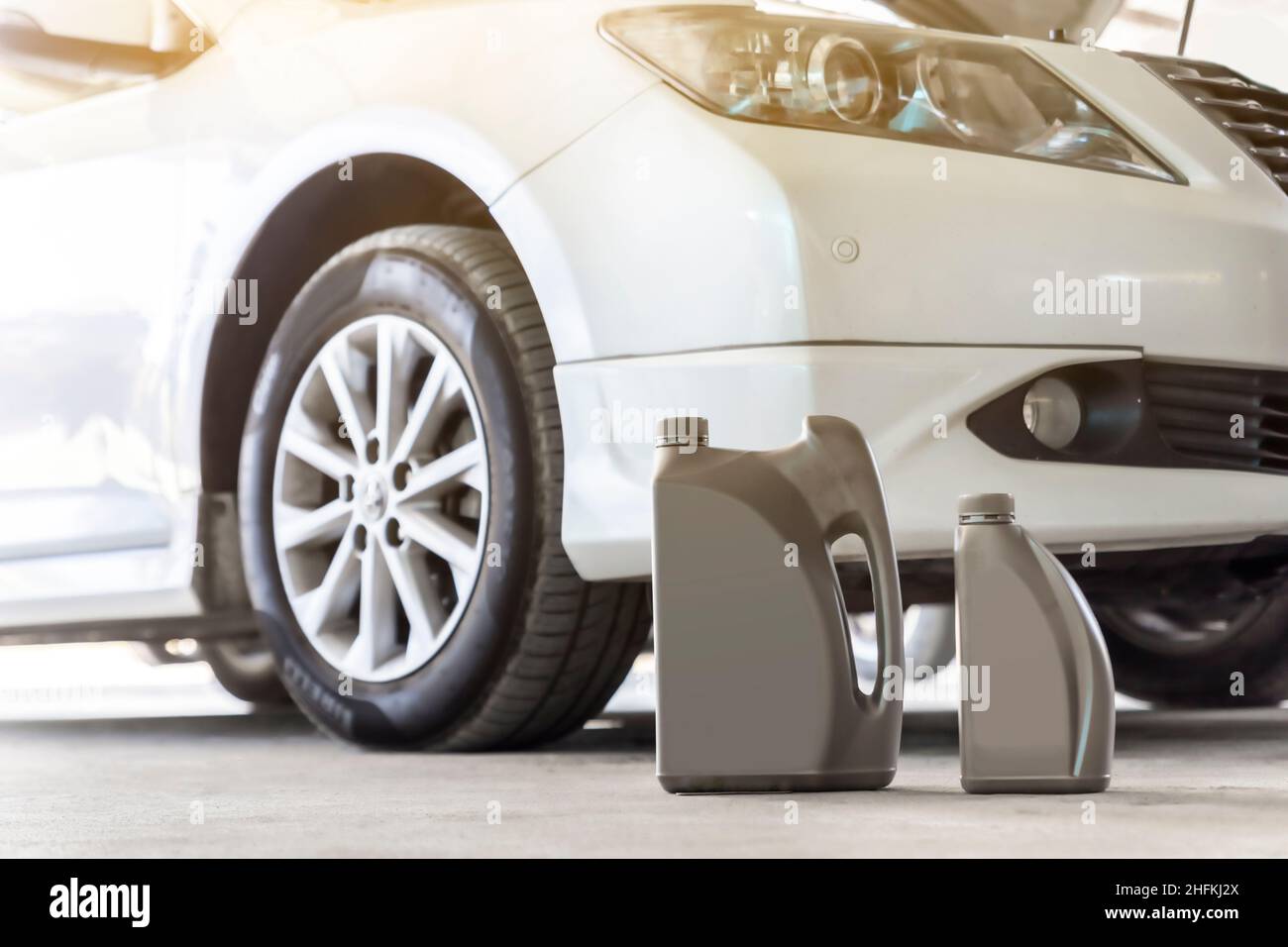 Engine oil preparing for oil change at maintenance repair service ...