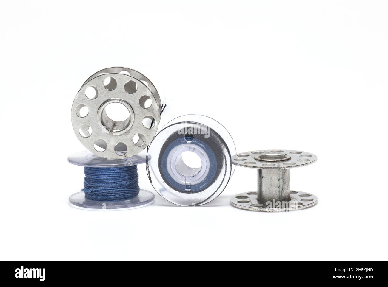 Close up of various rolls of sewing thread and thread for use in sewing ...