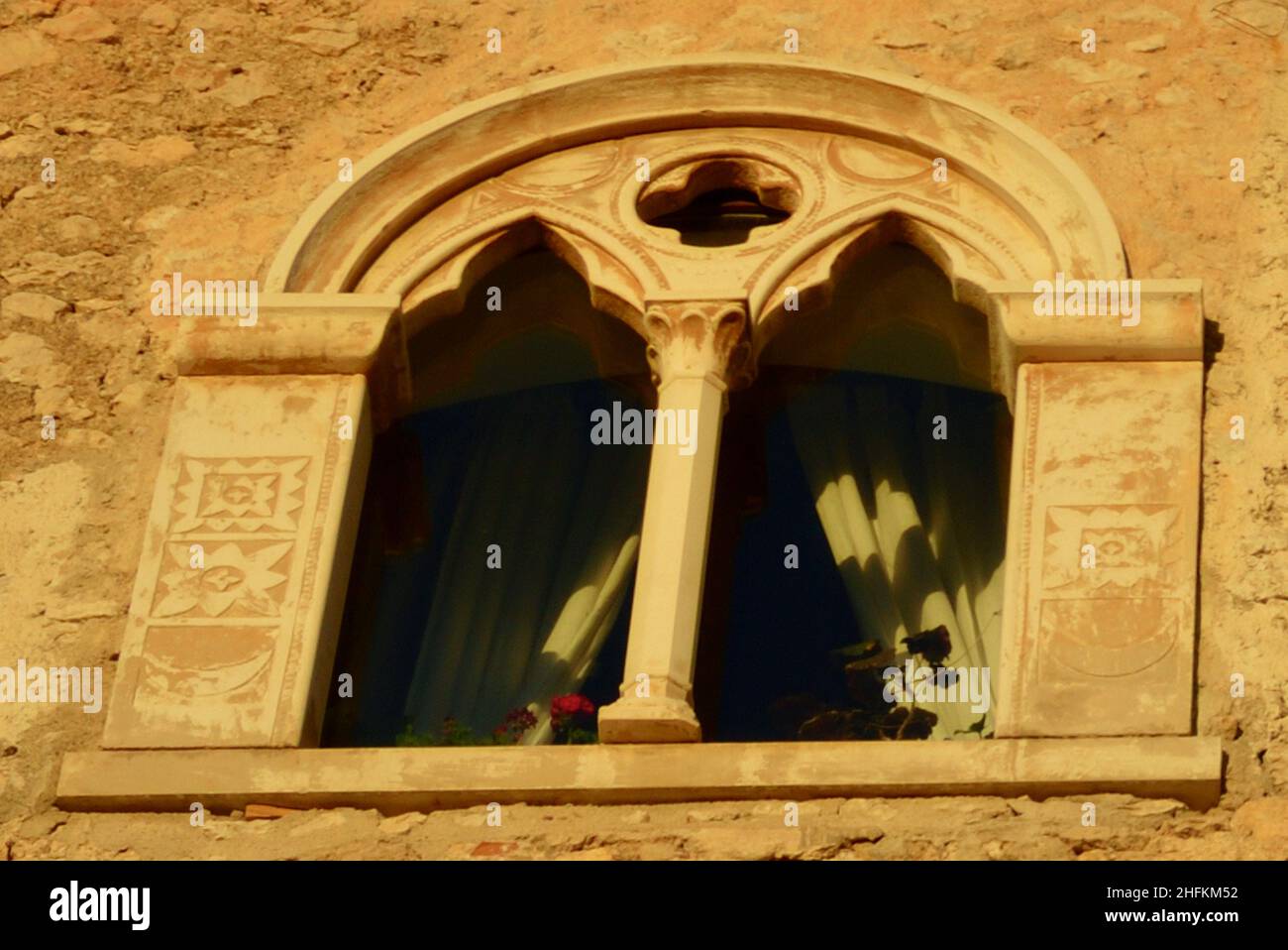 Gothic window in medieval historic building Stock Photo - Alamy