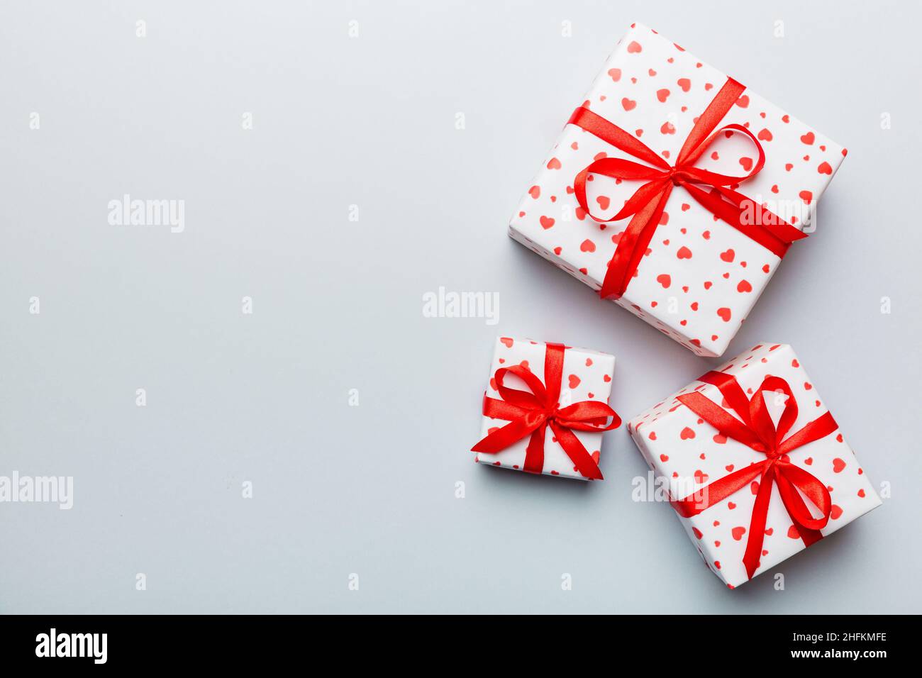 Valentine day composition: red gift box with bow and heart. Christmas ...