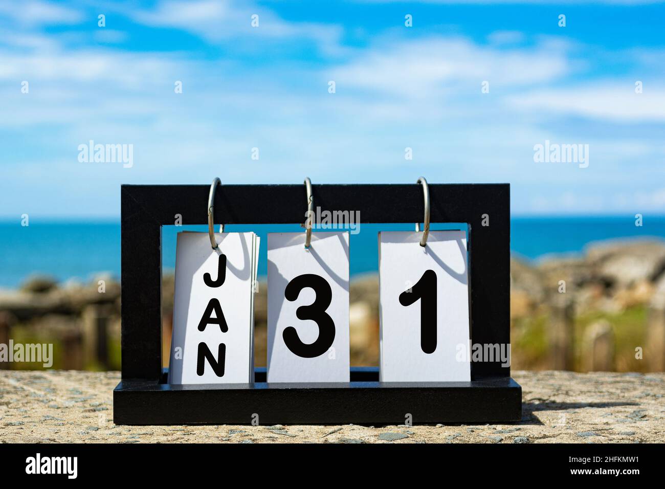 Jan 31 calendar date text on wooden frame with blurred background of ...